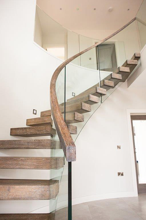 Floating and Curved Stairs with Glass Balustrade - Stairs Design and ...