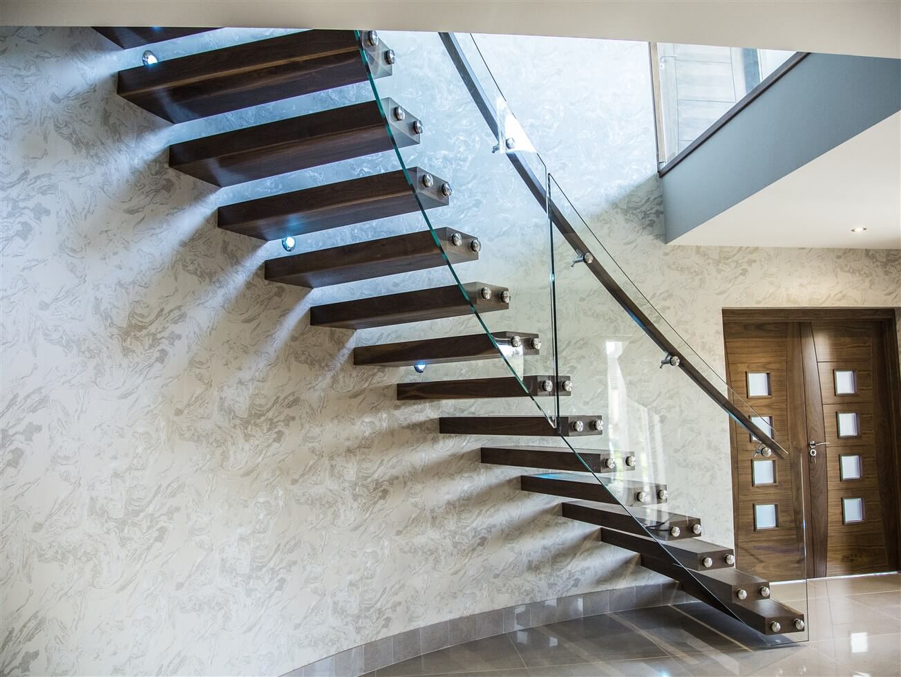 Curved floating walnut stairs - Banagher Co. Offaly Ireland