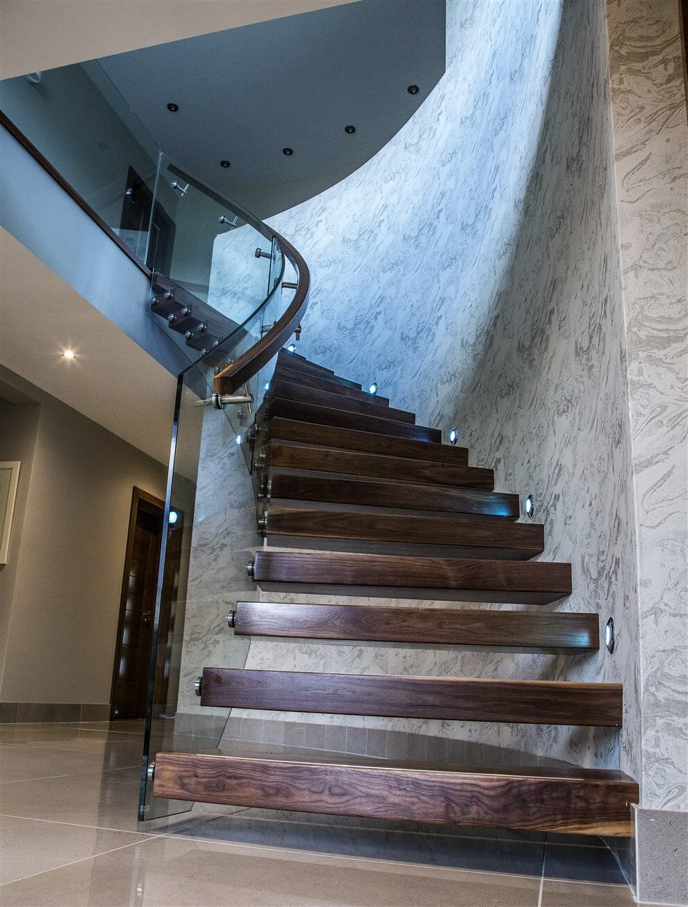 Curved floating walnut stairs - Banagher Co. Offaly Ireland